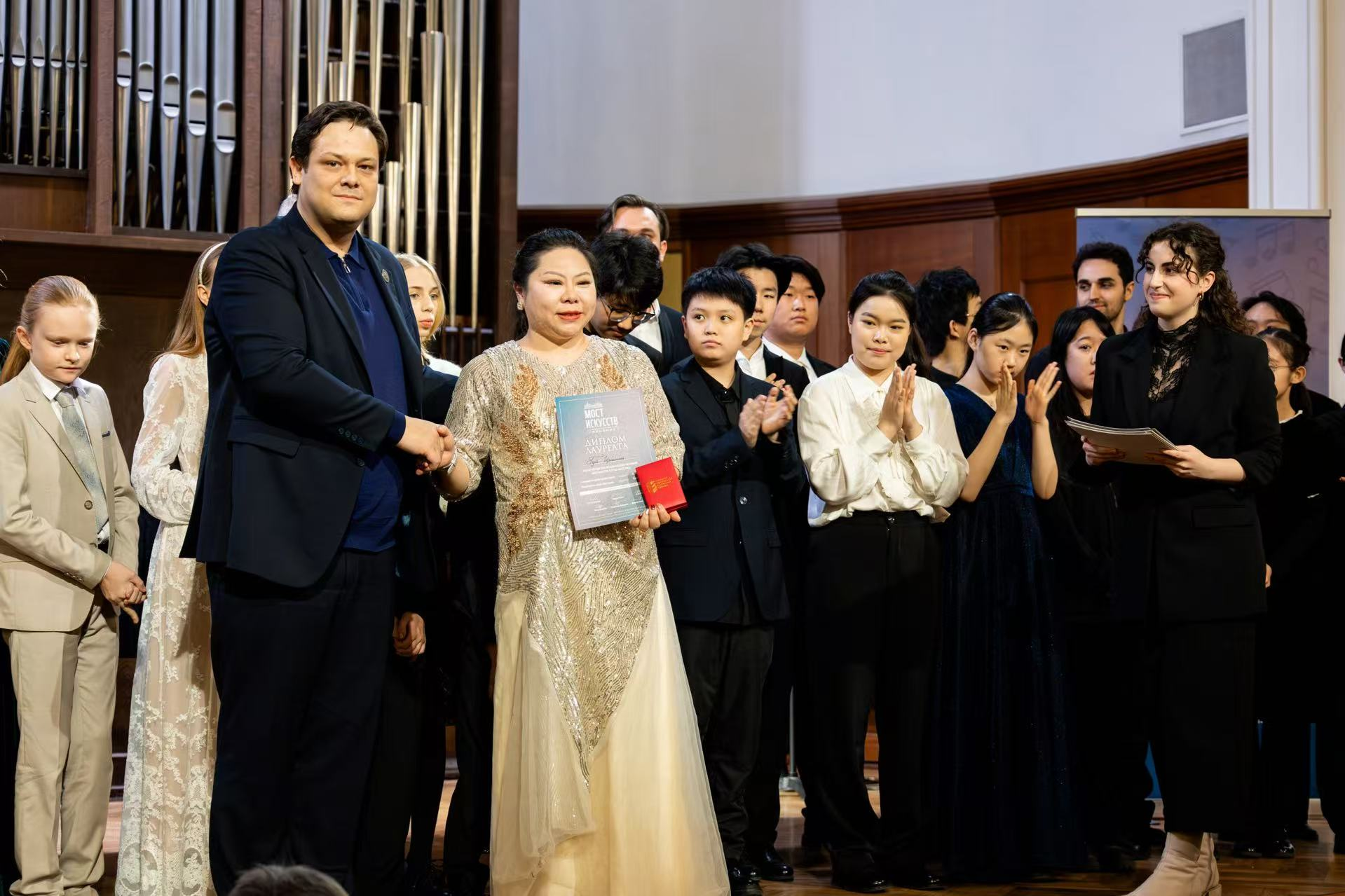 我校教师喜获莫斯科国际音乐节最佳俄罗斯作品演唱奖-湖北商贸学院招生信息网